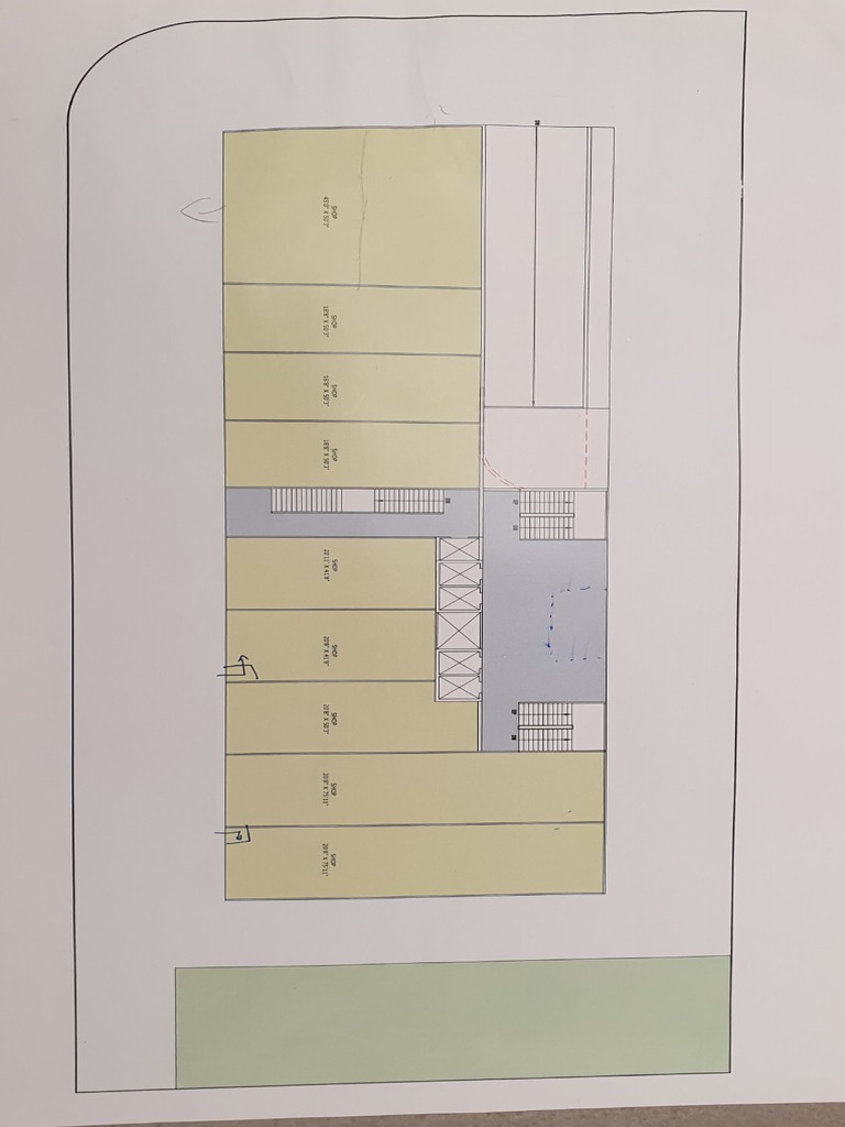 Floor plan layout for a large retail space featuring multiple shops and ...