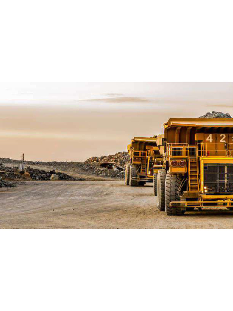 large-mining-rock-dump-trucks-transporting-platinum-ore-for-processing ...
